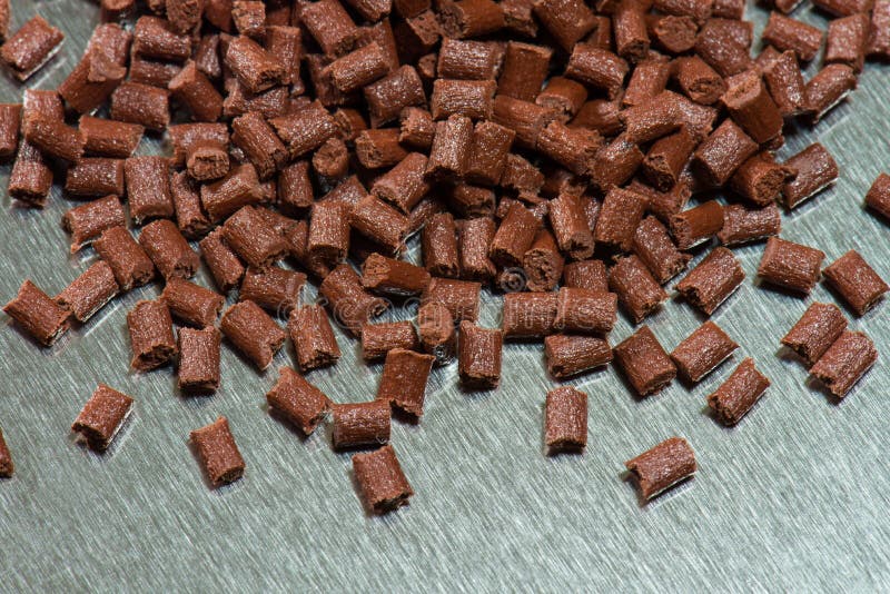 Brown Polymer Resin on Metal Sheet Stock Image - Image of granules ...