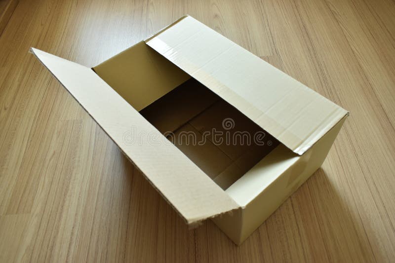 Brown Post Box Packaging Put on Wood Floor Stock Image - Image of floor ...