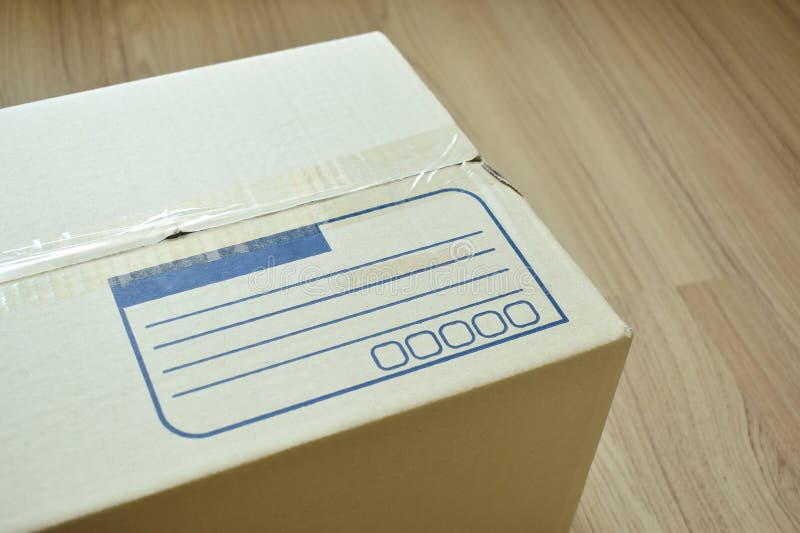 Brown Post Box Packaging Put on Wood Floor Stock Photo - Image of ...