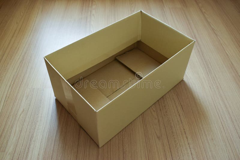 Brown Post Box Packaging Put on Wood Floor Stock Photo - Image of kraft ...