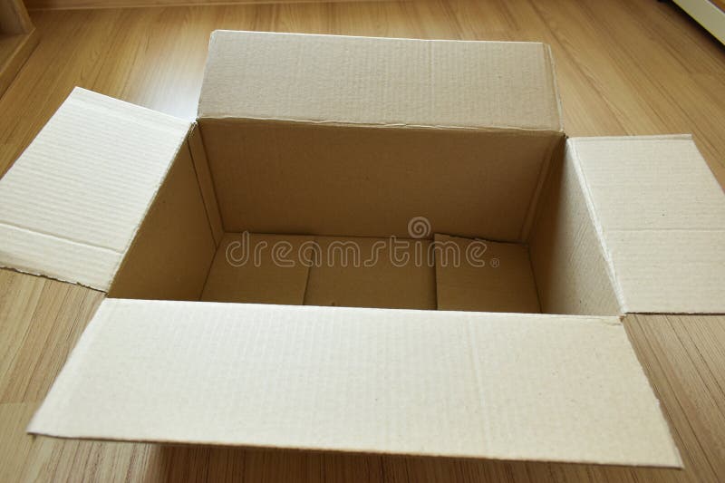 Brown Post Box Packaging Put on Wood Floor Stock Image - Image of ...