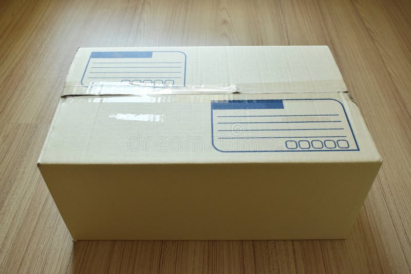 Brown Post Box Packaging Put on Wood Floor Stock Image - Image of board ...
