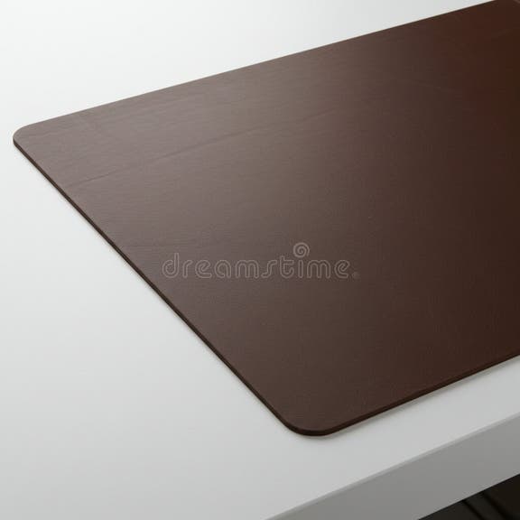 Brown Rectangular Leather Desk Mat with Rounded Corners Placed on a ...