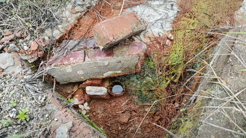 Brown or Reddish Rusty-colored Stains on Dried Puddle Soil Surface ...