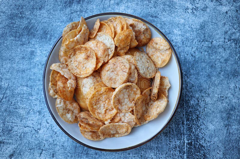 Brown Rice Chips with Spices and Salt in Bowl Stock Image - Image of ...