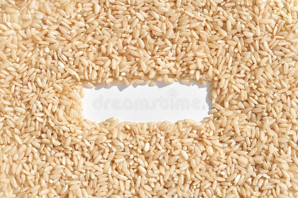 Brown Rice Grains Forming a Rectangular Border on White Background ...