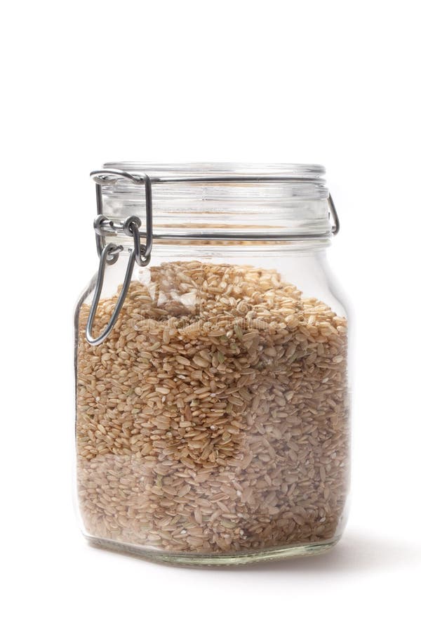 Brown Rice in a Jar stock photo. Image of cereal, organic - 40593940
