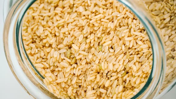 Brown Rice - Low Carbohydrate on an Isolated White Background Stock ...