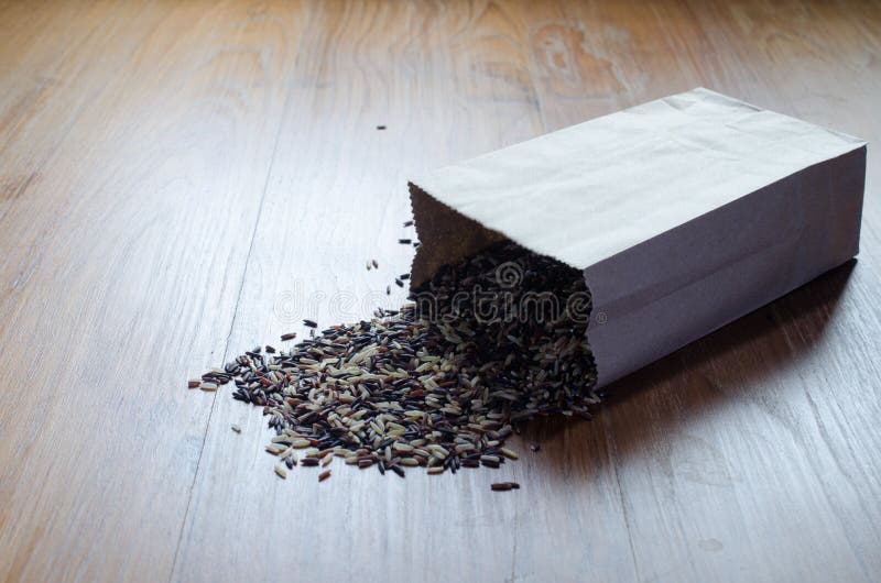 Brown Rice with Paper Bag on Wooden Board Stock Image - Image of wheat ...