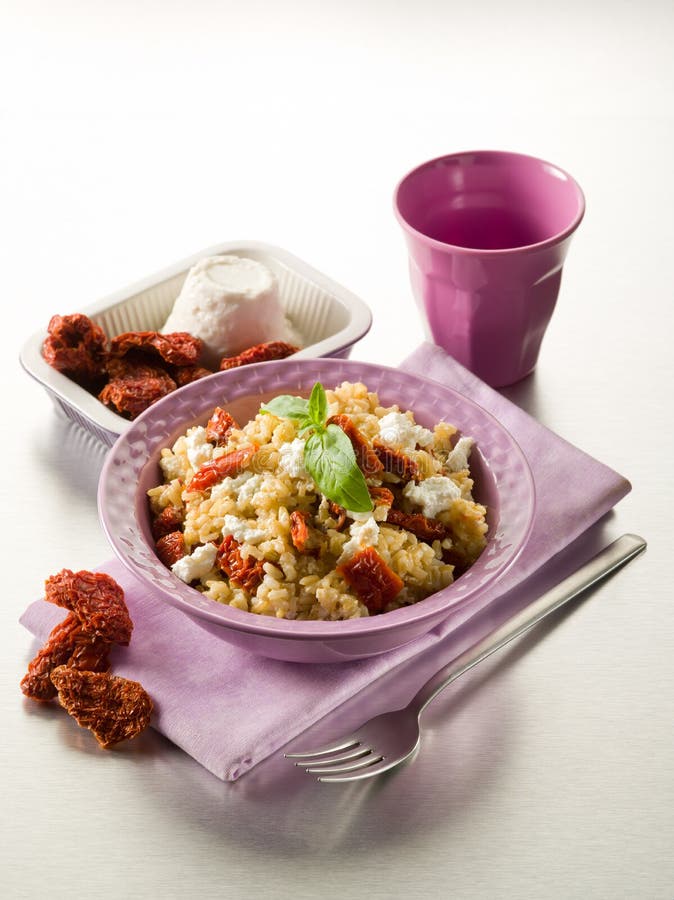 Brown rice with ricotta stock photo. Image of pepper - 24329044