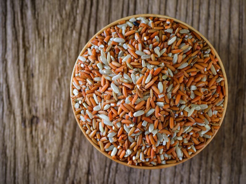 Brown rice seed in bowl stock image. Image of rice, brown - 119531731