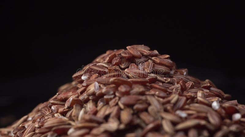 Brown Rice Spin on Table and Rice Fall Down on it. Nice Cinematic ...