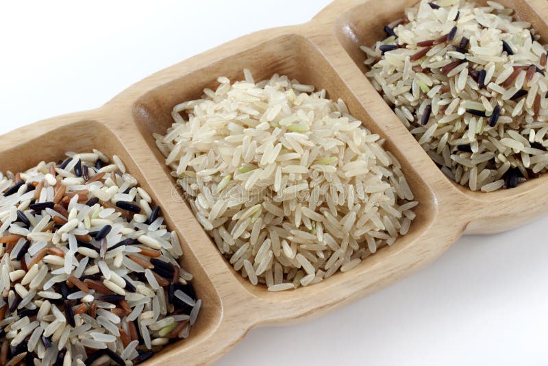 Brown rice in the spoon stock image. Image of japanese - 41451329