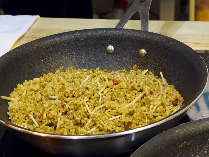 Brown rice with vegetables stock photo. Image of pilaf - 94907576