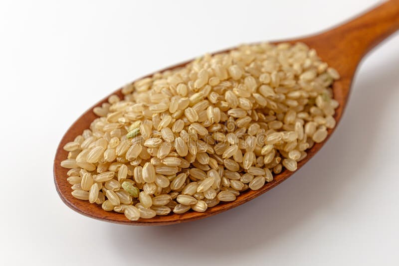 Brown Rice on a White Background Stock Photo - Image of fiber, healthy ...