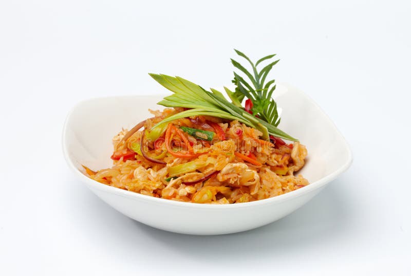 Brown rice on white plate. stock image. Image of green - 106723617