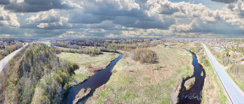 Brown River between Spring Meadow and Forest Stock Photo - Image of ...