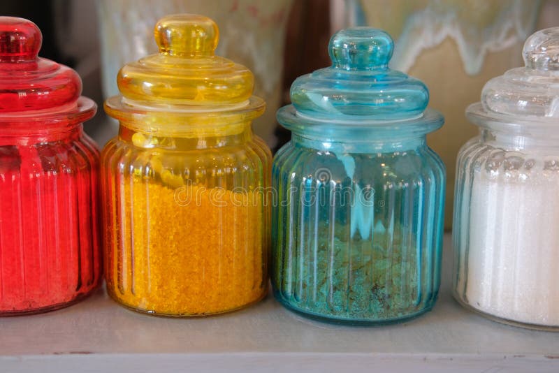 Brown Rock Sugar in Red Yellow Blue Glass Jar Pot Stock Photo - Image ...