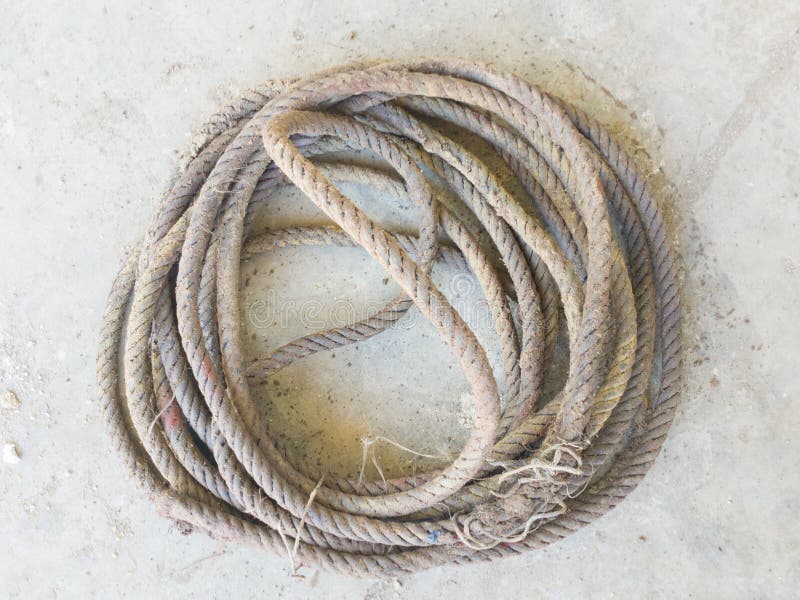 Brown Rope on the Concrete Floor, Usually Used To Pull and Lift Loads ...