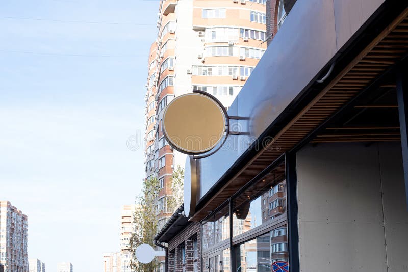 Brown Round Logo on Brick Wall Building Exterior for Mockup Design ...