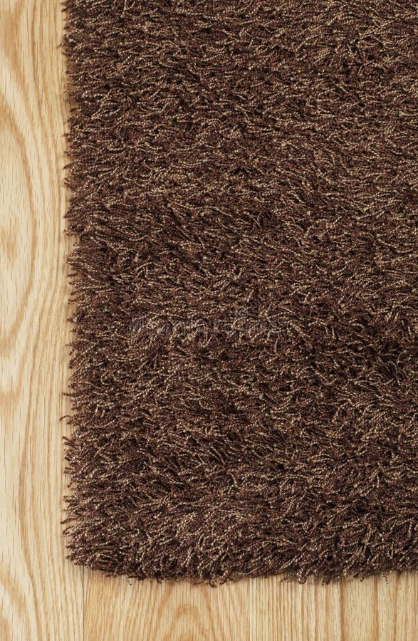 Brown rug stock photo. Image of floor, furry, corner, fluffy - 9773412