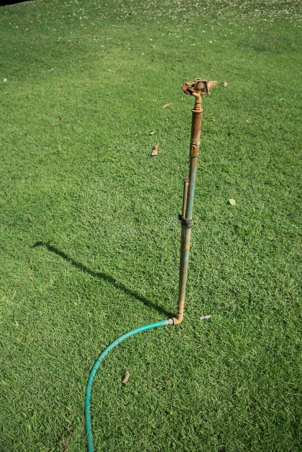 Brown rusty sprinkler stock image. Image of water, sprinkler - 69214531