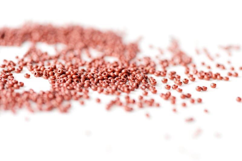 Brown Seed Beads on Textile Background Close Up Stock Photo - Image of ...