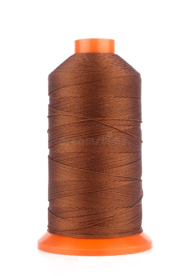Brown sewing thread stock image. Image of polyester, production - 33234133