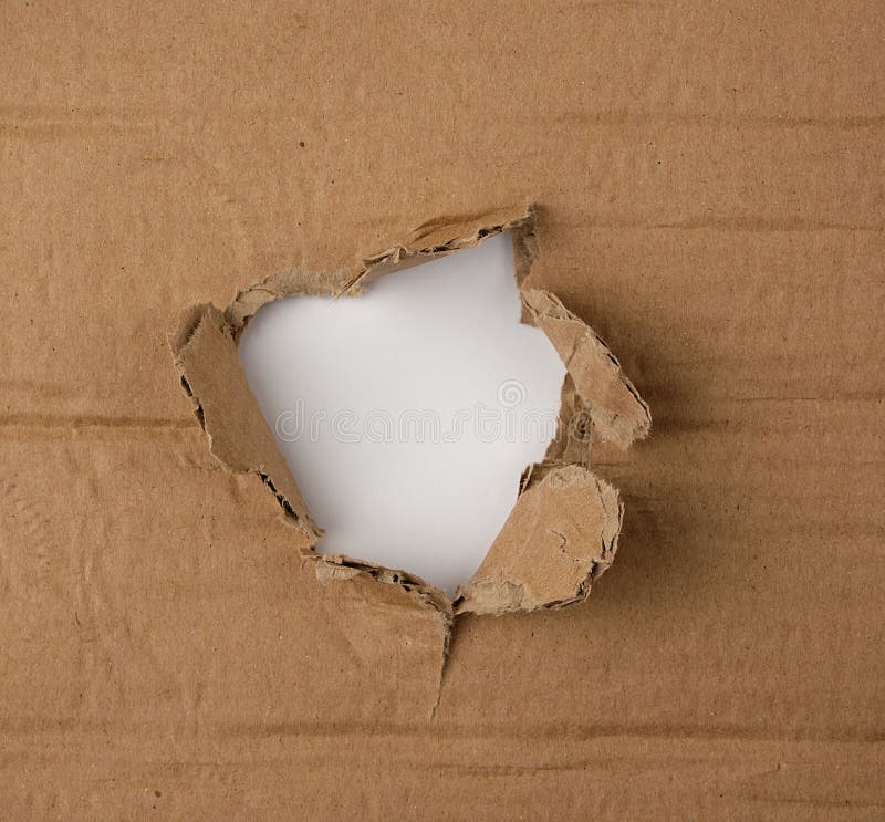 Brown Sheet of Paper with a Hole, Full Frame Stock Image - Image of ...