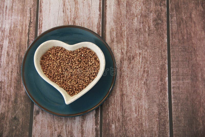 Brown Small Grains of Buckwheat in a Decorative Glass Plate Stock Photo ...