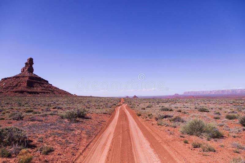 Brown Soil Road Under Clear Sky Stock Photo - Image of sand, horizon ...