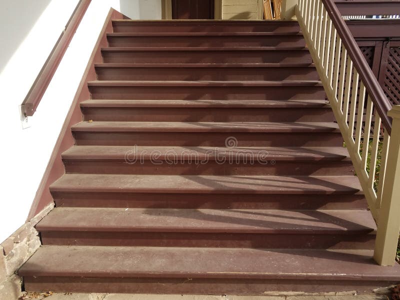 Brown Stairs or Steps with Railing and Shadows Stock Image - Image of ...