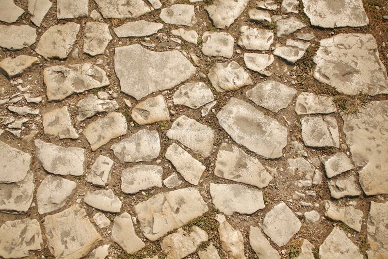 Brown Stone Pavement Paved with Large Cobblestones Stock Image - Image ...