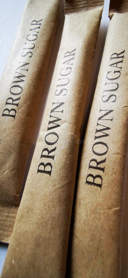 Brown Sugar in Paper Bags, Shot Close Up. Stock Image - Image of packet ...
