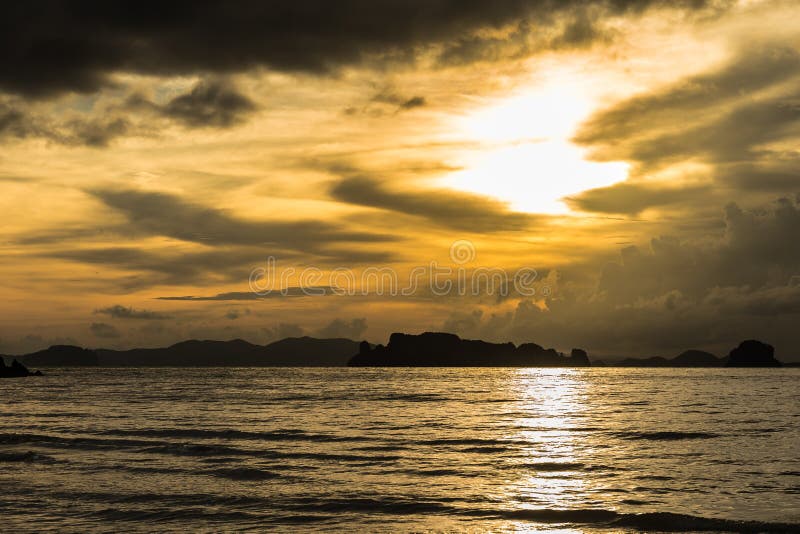 Brown Sunset at Ao Nang Beach, Krabi, Thailand Stock Image - Image of ...