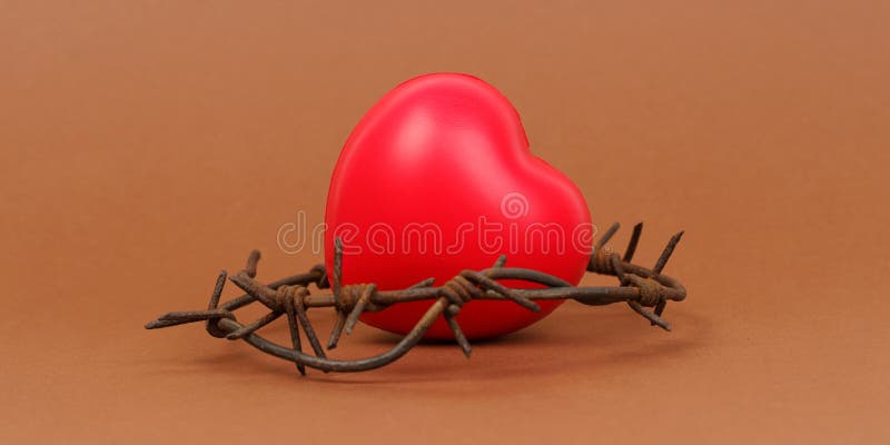 On the Brown Surface is a Red Heart, Which is Surrounded by Barbed Wire ...