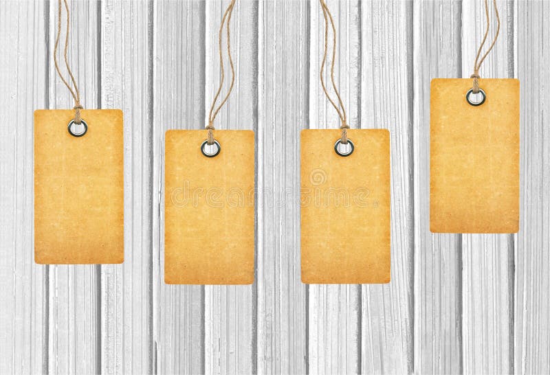 Brown tags on wooden stock image. Image of label, sale - 51191003