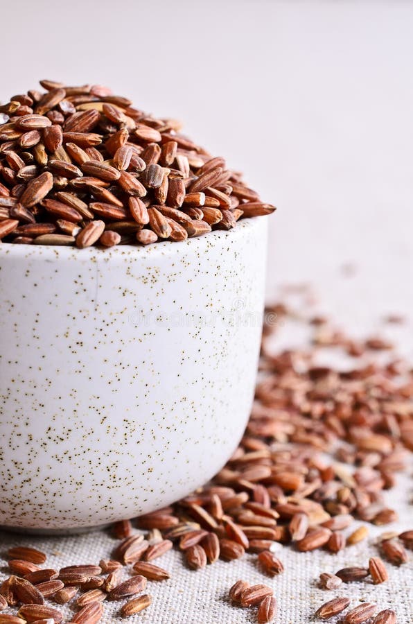 Brown unpolished rice stock photo. Image of crop, heap - 50696442