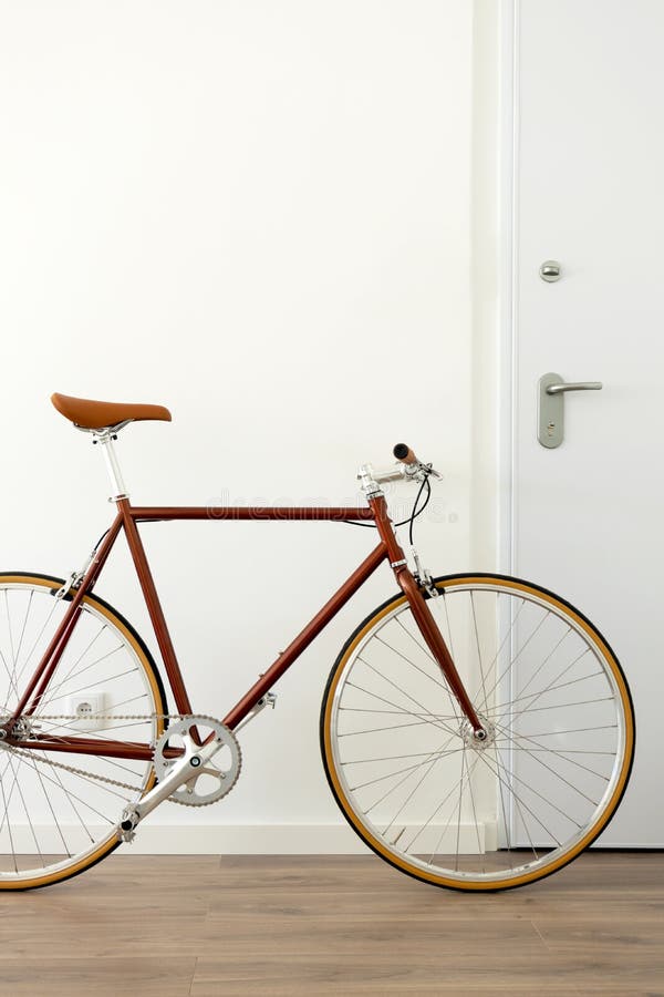 Brown Urban Bicycle at Apartment Home, Vertical Stock Photo - Image of ...
