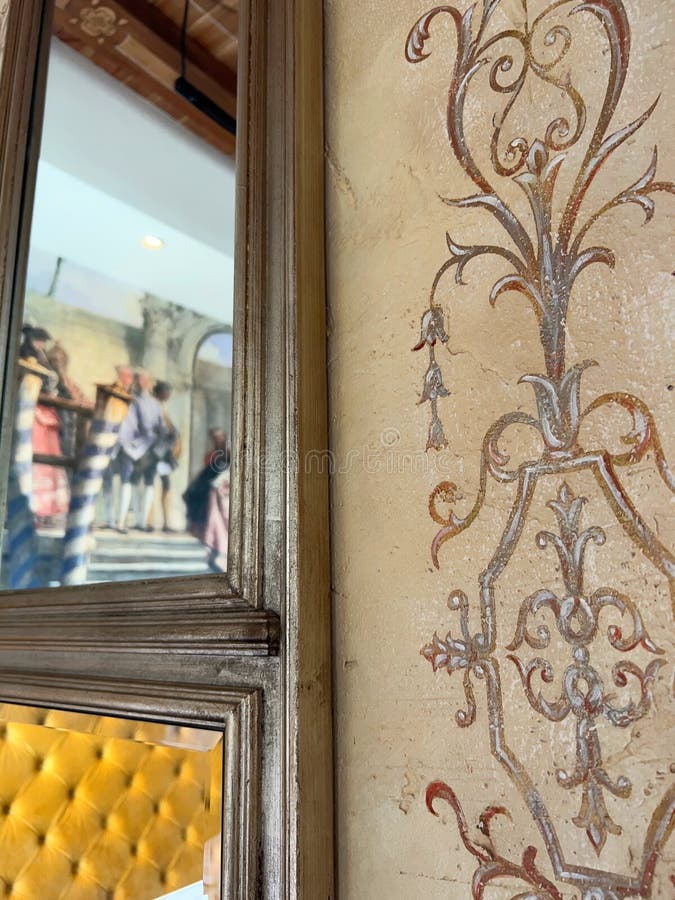 Brown Wall with Pattern and Mirror Stock Photo - Image of wall, iron ...