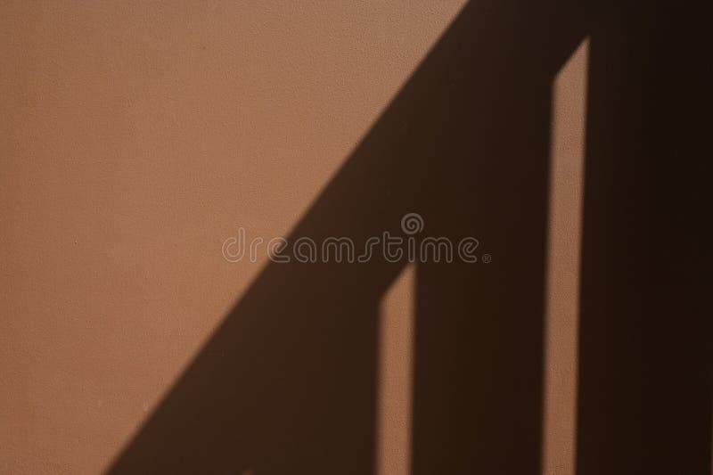 Brown Wall Textured Background with Railing Shadow Stock Photo - Image ...