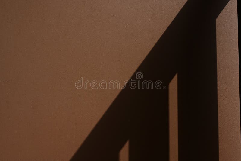 Brown Wall Texture Background with Railing Shadow Stock Photo - Image ...