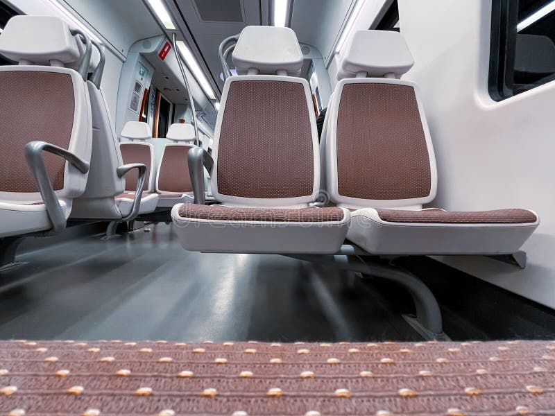 Brown White Seats in the Interior of a Train Wagon Stock Photo - Image ...