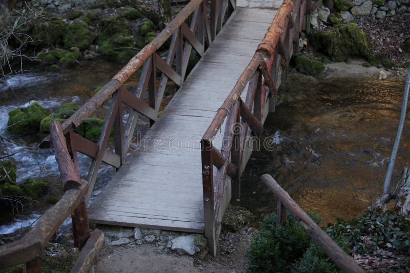 Brown Wooden Bridge Across the River Stock Image - Image of wooden ...