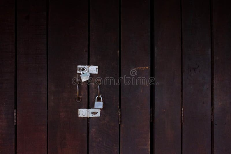 The Brown Wooden Foldable Door and Silver Lock. Stock Photo - Image of ...