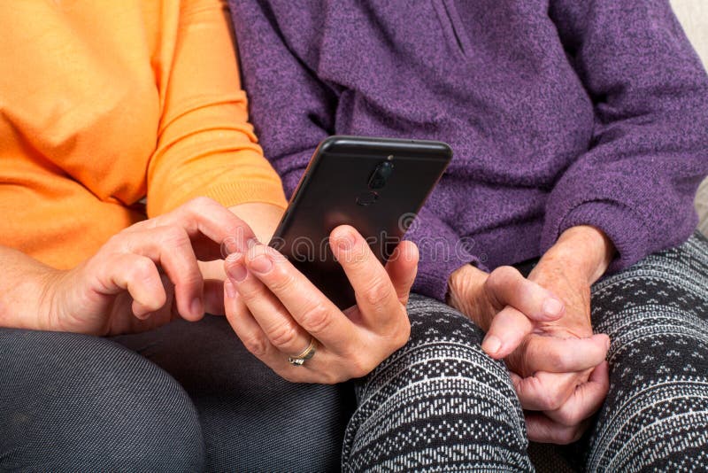 Browsing mobile internet stock image. Image of grandparent - 133768779