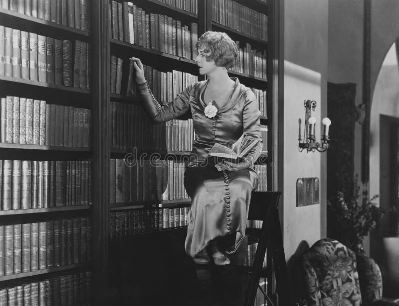 Browsing the Reading Material Stock Photo - Image of books, group: 52033322