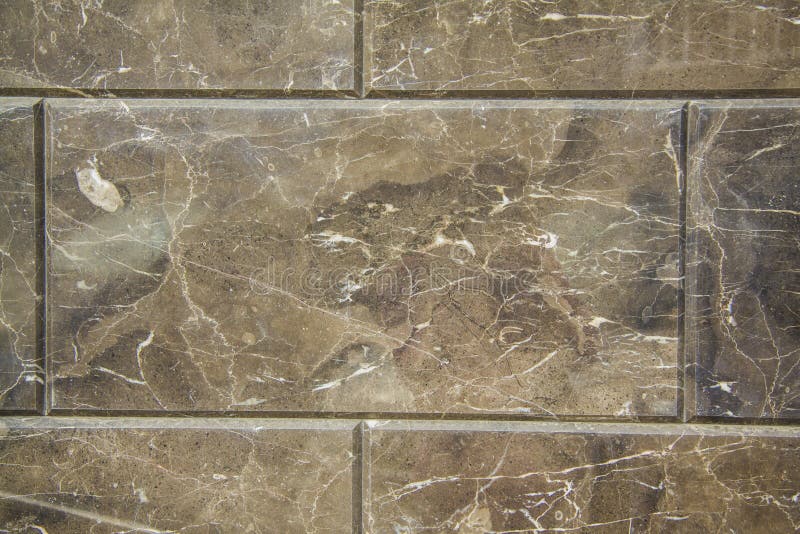 Brun marmor med guld- åder fotografering för bildbyråer. Bild av textur ...