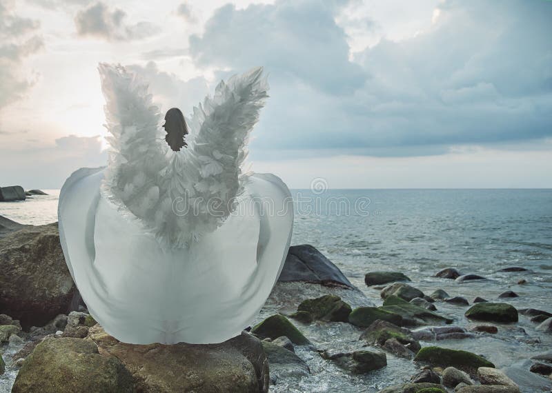 Brunette Angel Walking Alongside the Coastline Stock Image - Image of ...