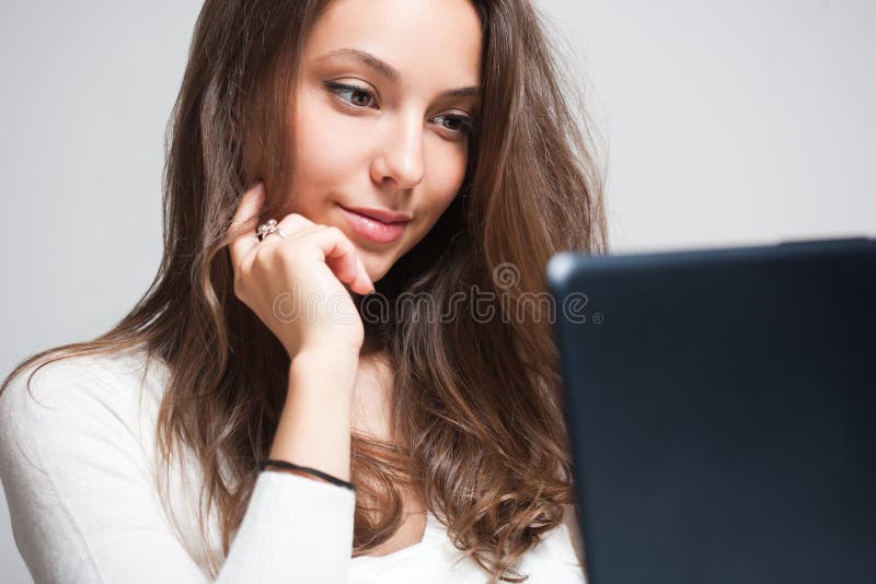 Brunette Beauty Using Laptop. Stock Image - Image of hispanic, away ...